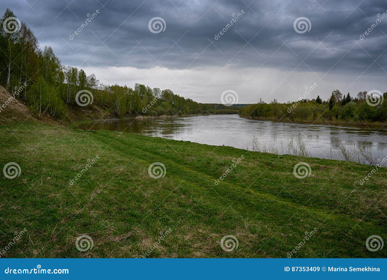 Fantastic River with Fresh Green Grass in the Sunlight. Stock Image ...