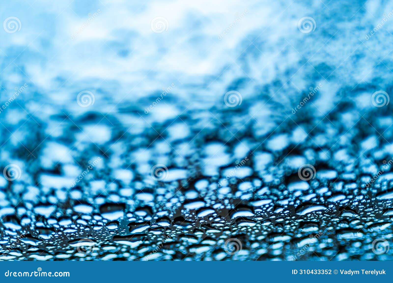 Fantastic View of Clear Big and Small Raindrops on a Glass on Blue ...