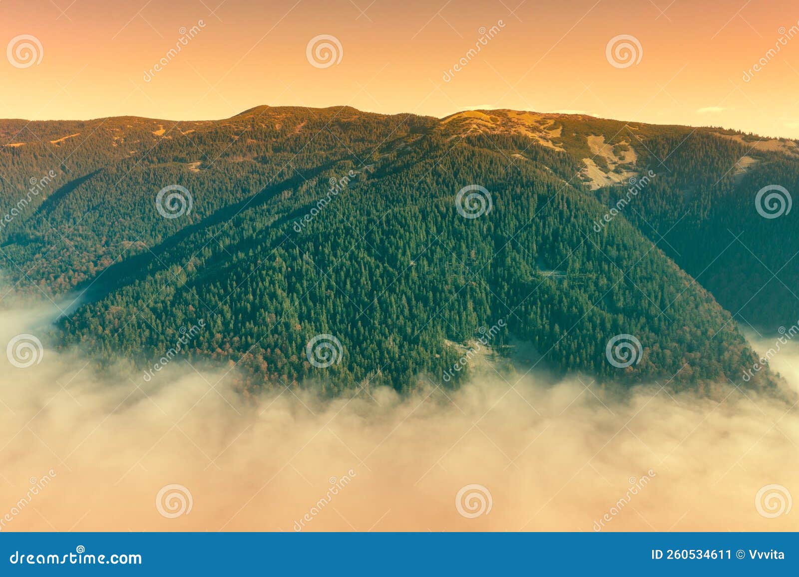 Mountains above the clouds stock image. Image of aerial - 260534611