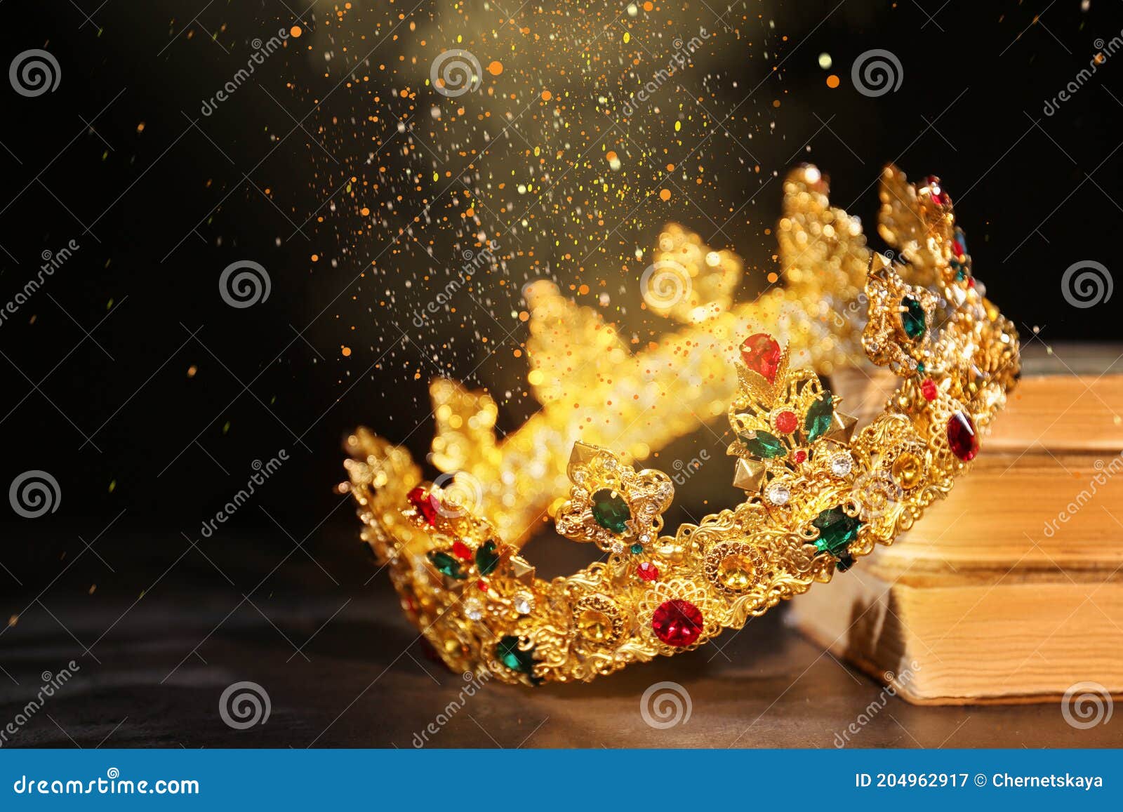 Fantasy World. Beautiful Golden Crown and Old Books Lit by Magic Light ...