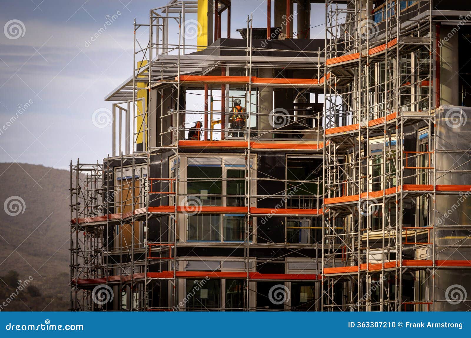 Far Shot of a Construction Worker Working in a Large Commercial ...