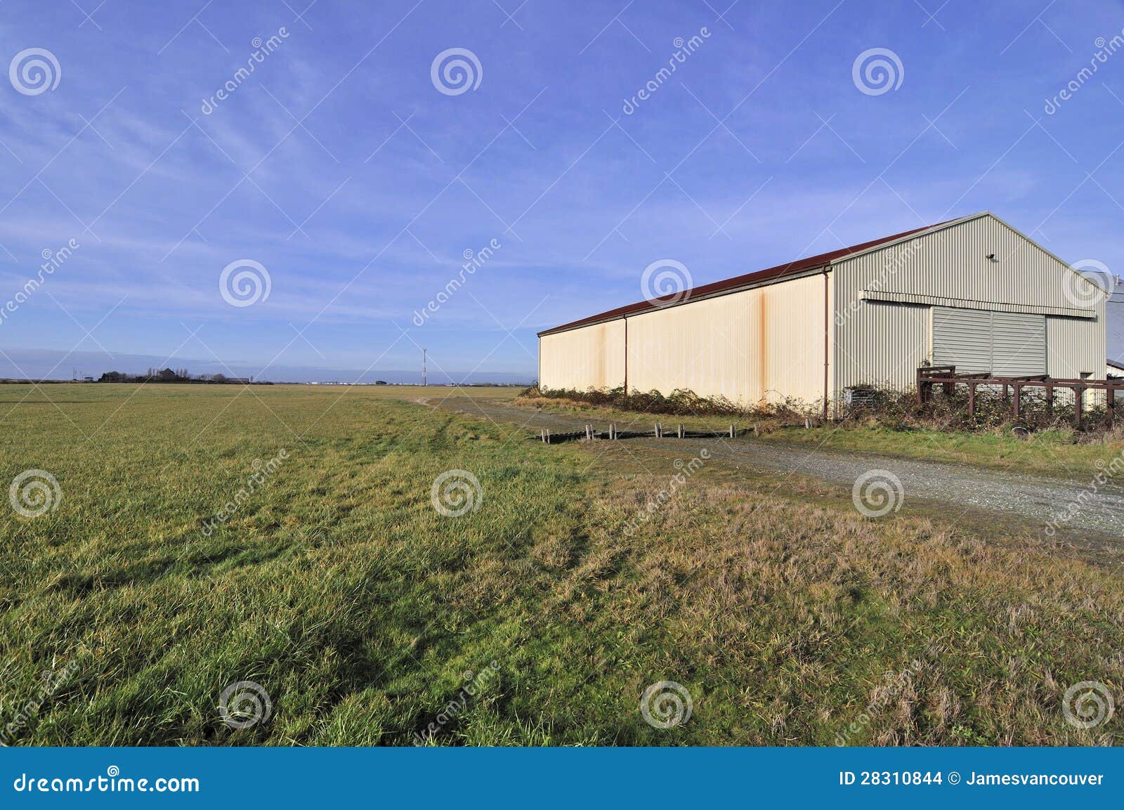 Farm Buildings by the Field Stock Photo - Image of white, field: 28310844