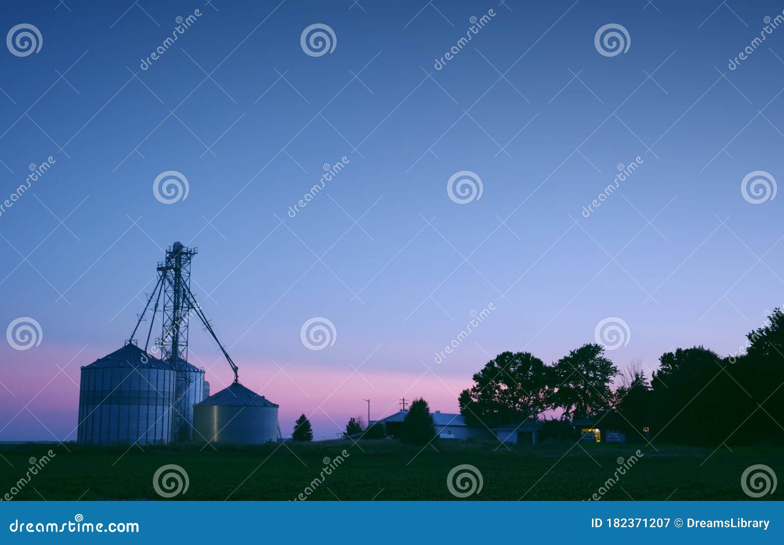 Farm at Dusk, Grain Silo, Trees, Barn, and Fields 1 Stock Image - Image ...