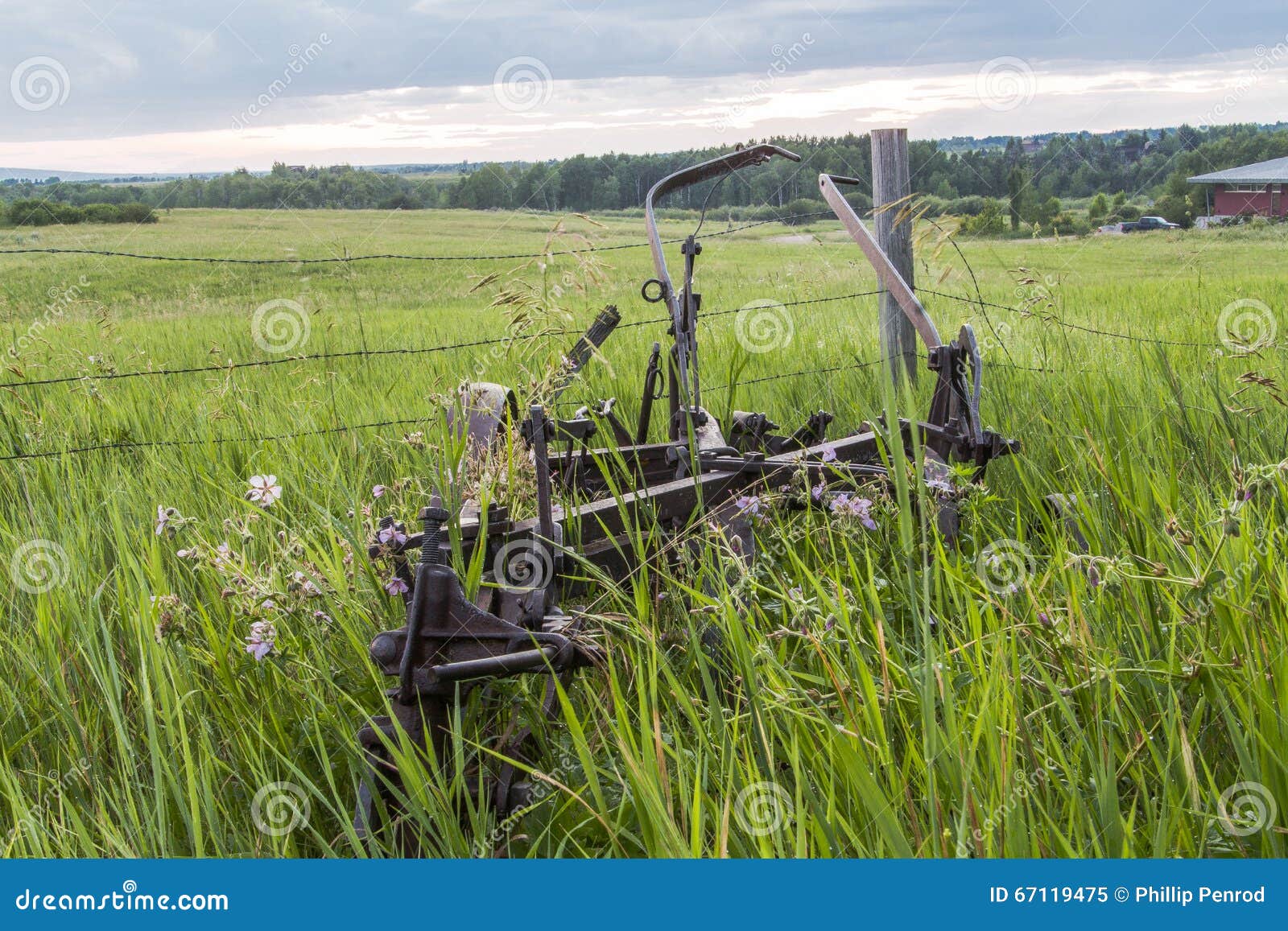 Farm equipment in a field stock image. Image of field - 67119475