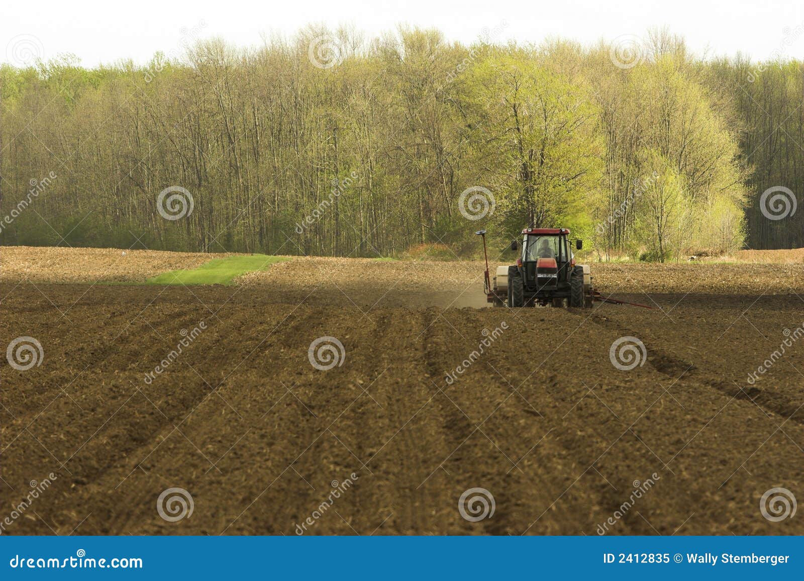 Farm field being tilled stock image. Image of farm, crop - 2412835