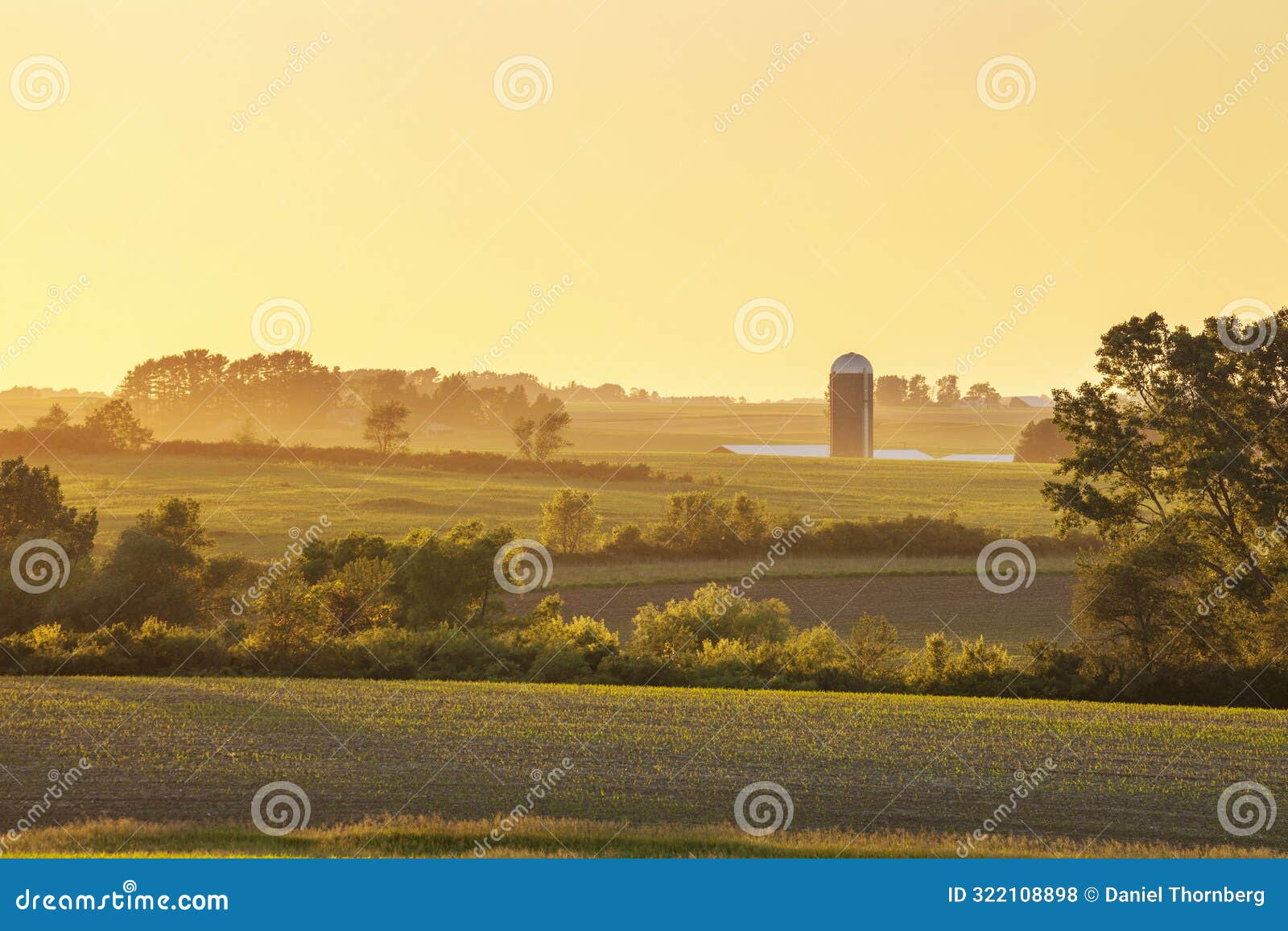 Farm and Fields and Trees at Sunset in Northeastern Iowa during the ...