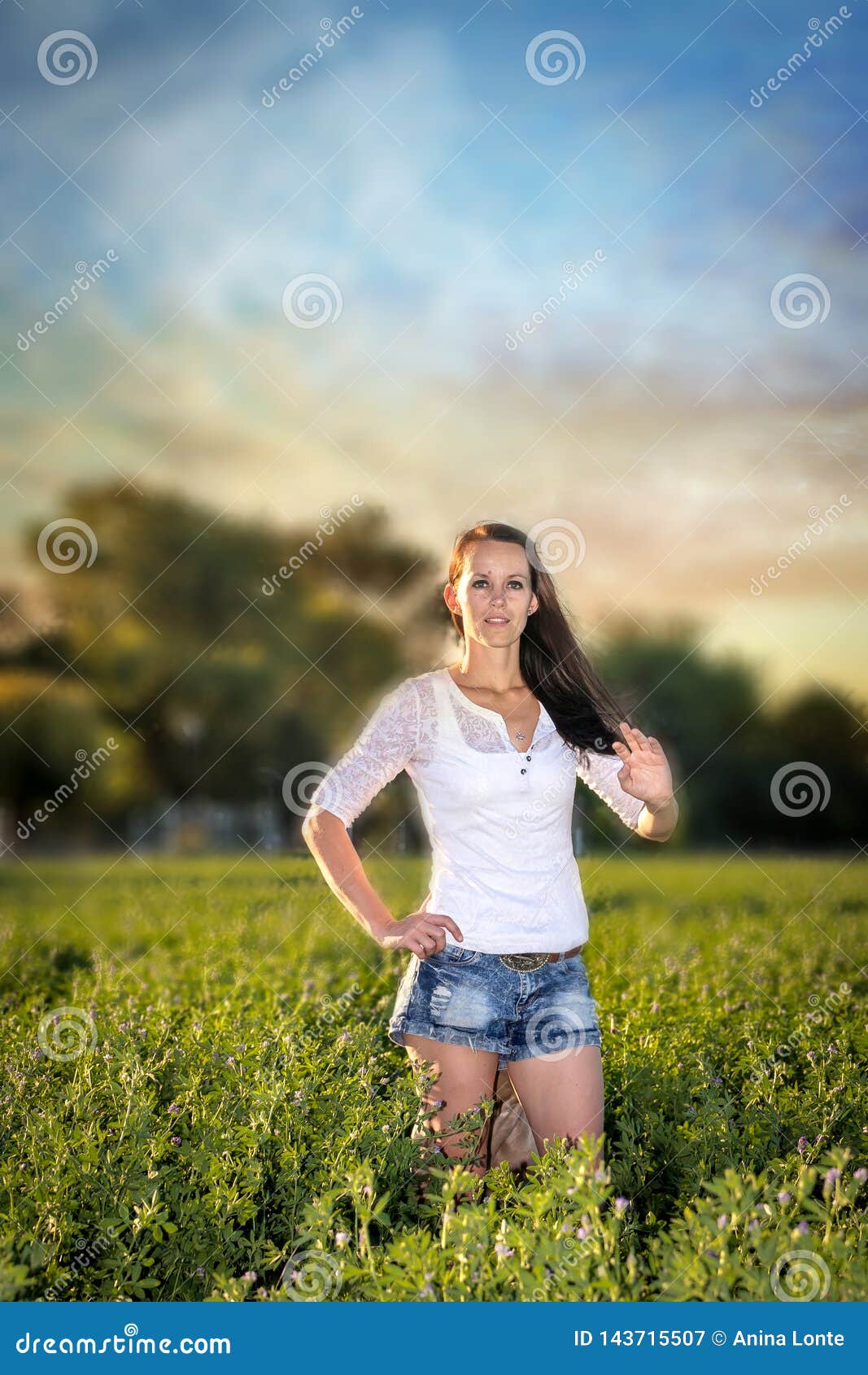 Farm girl in a green field stock image. Image of countryside - 143715507