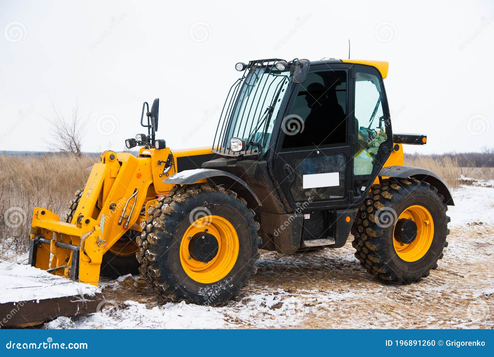 Farm loader at work stock photo. Image of plant, fodder - 196891260