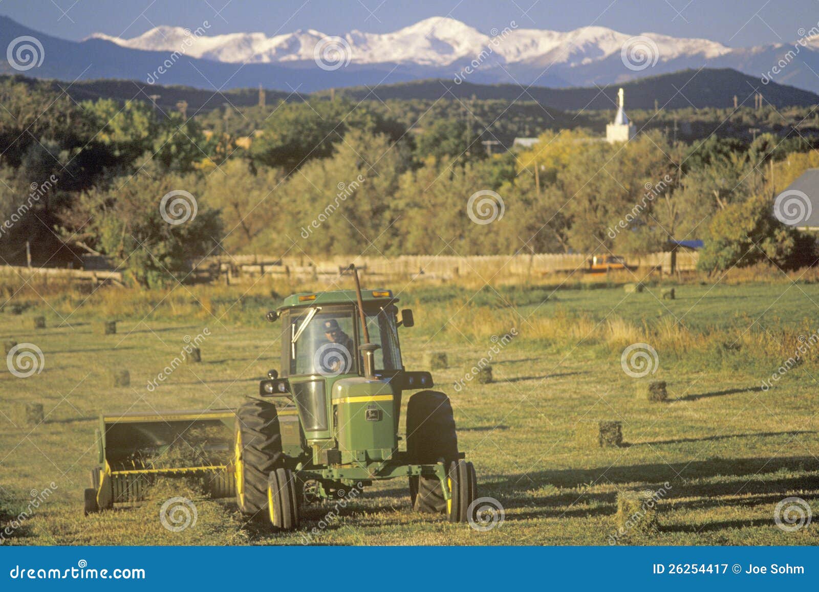 Farm Machinery Mowing in Field Editorial Photography - Image of color ...