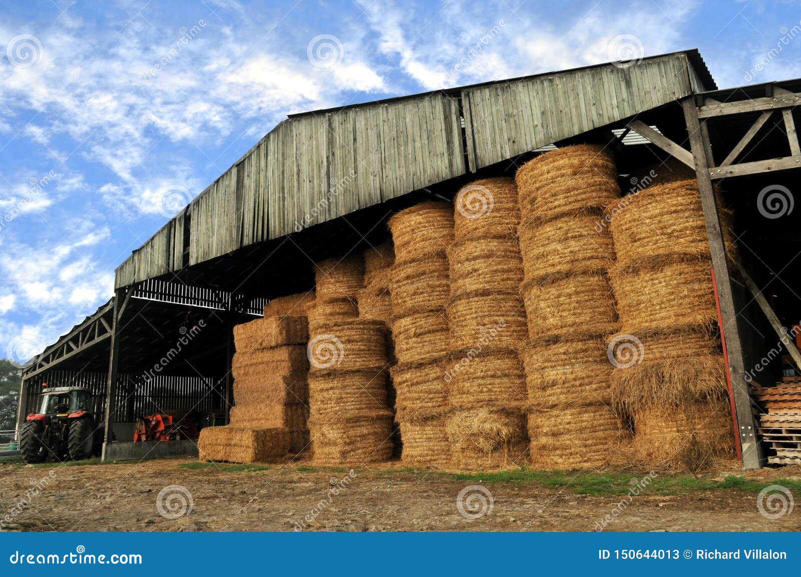 Straw rolls in a farm barn stock image. Image of nature - 150644013