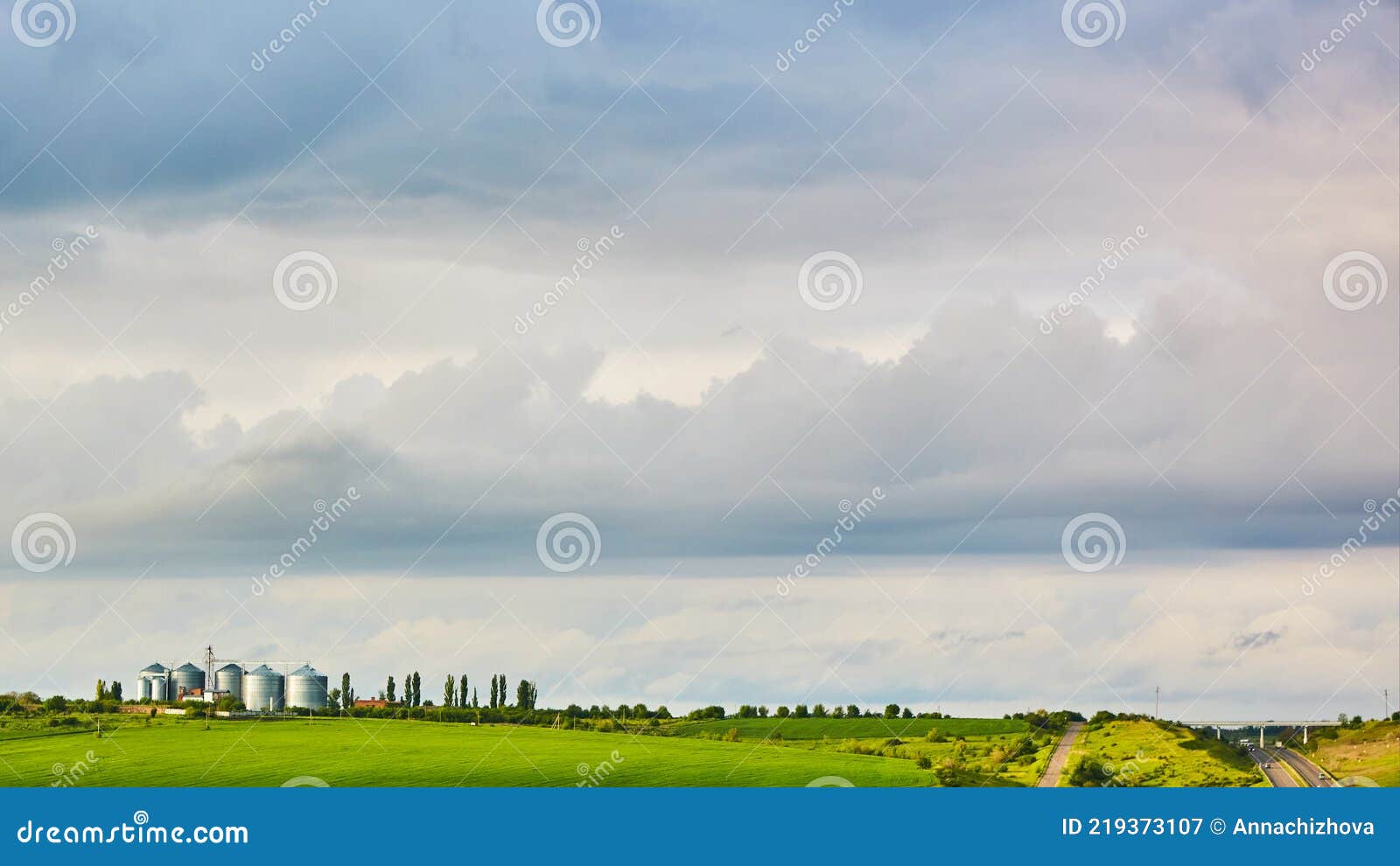 Farm Silos at a Distant Farm at Sunset. Stock Image - Image of country ...