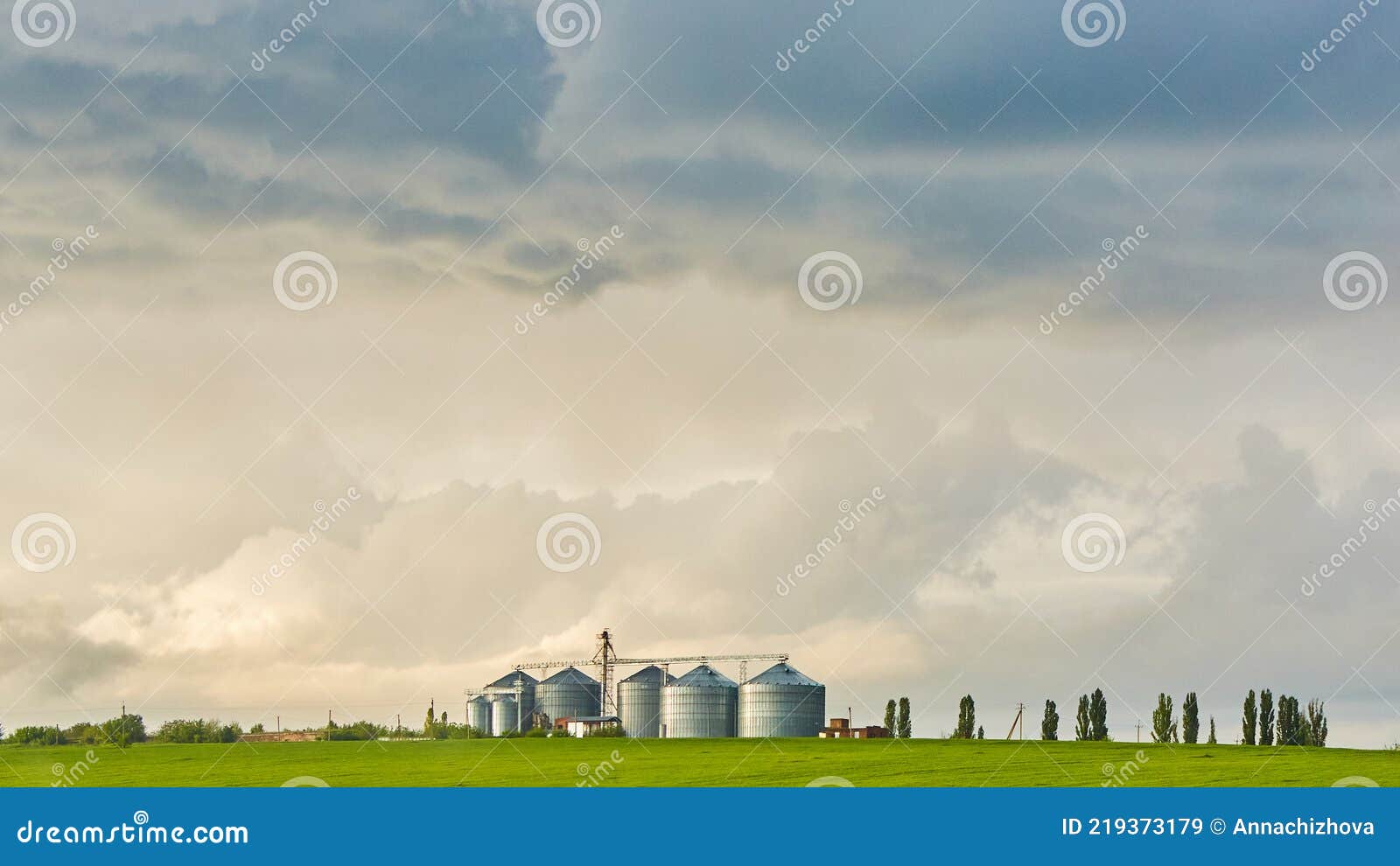 Farm Silos at a Distant Farm at Sunset. Stock Image - Image of nature ...