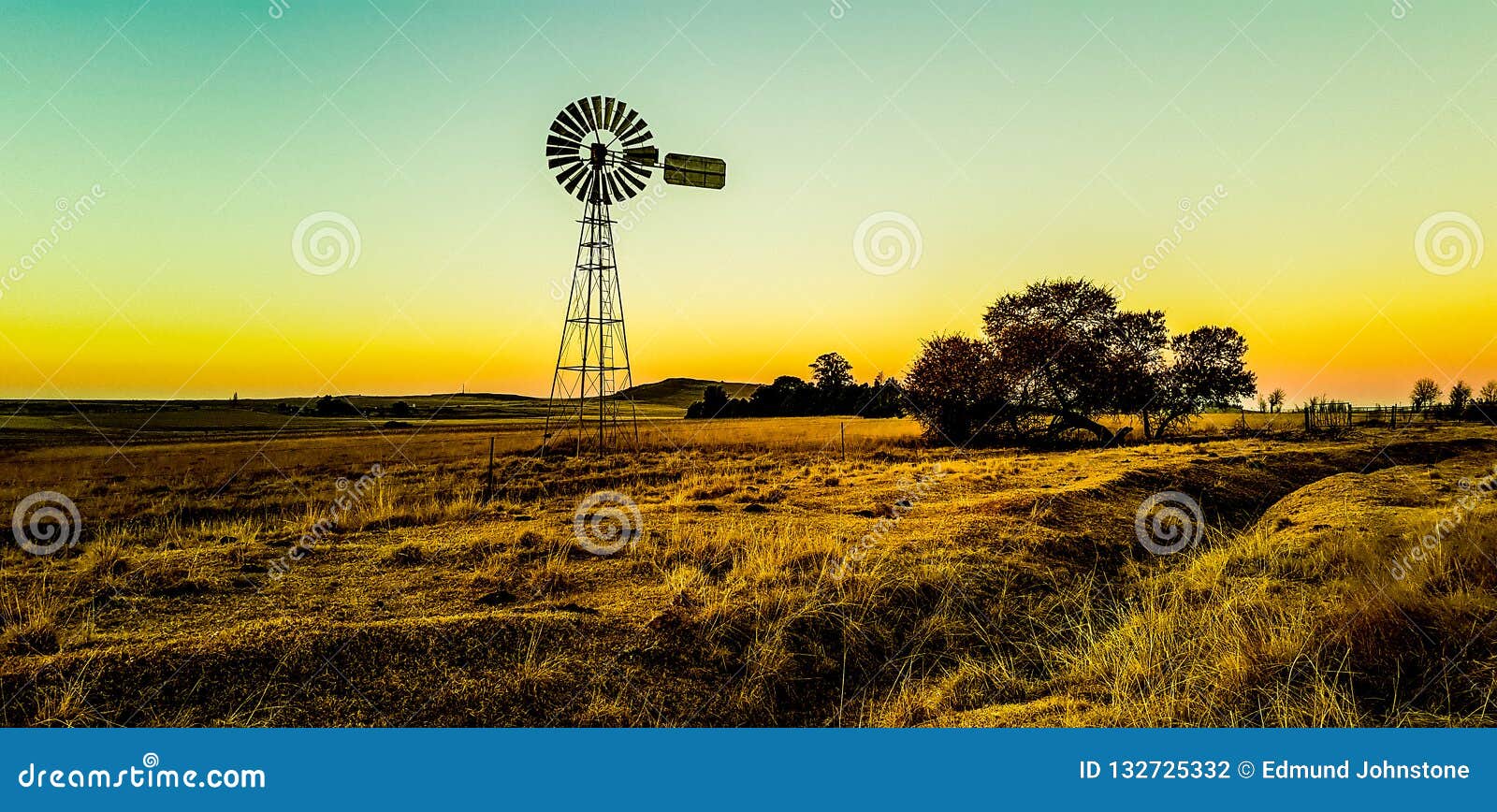 Farm Sunset Windmill stock photo. Image of sunset, winter - 132725332