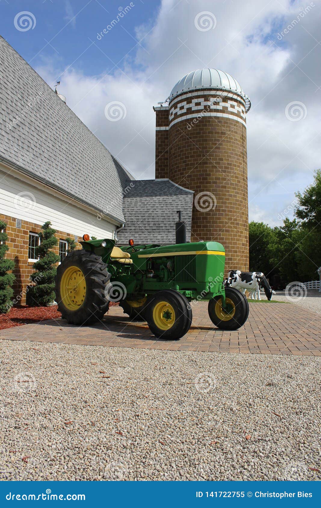Farm Tractor in Front of a Barn and Silo Editorial Image - Image of ...
