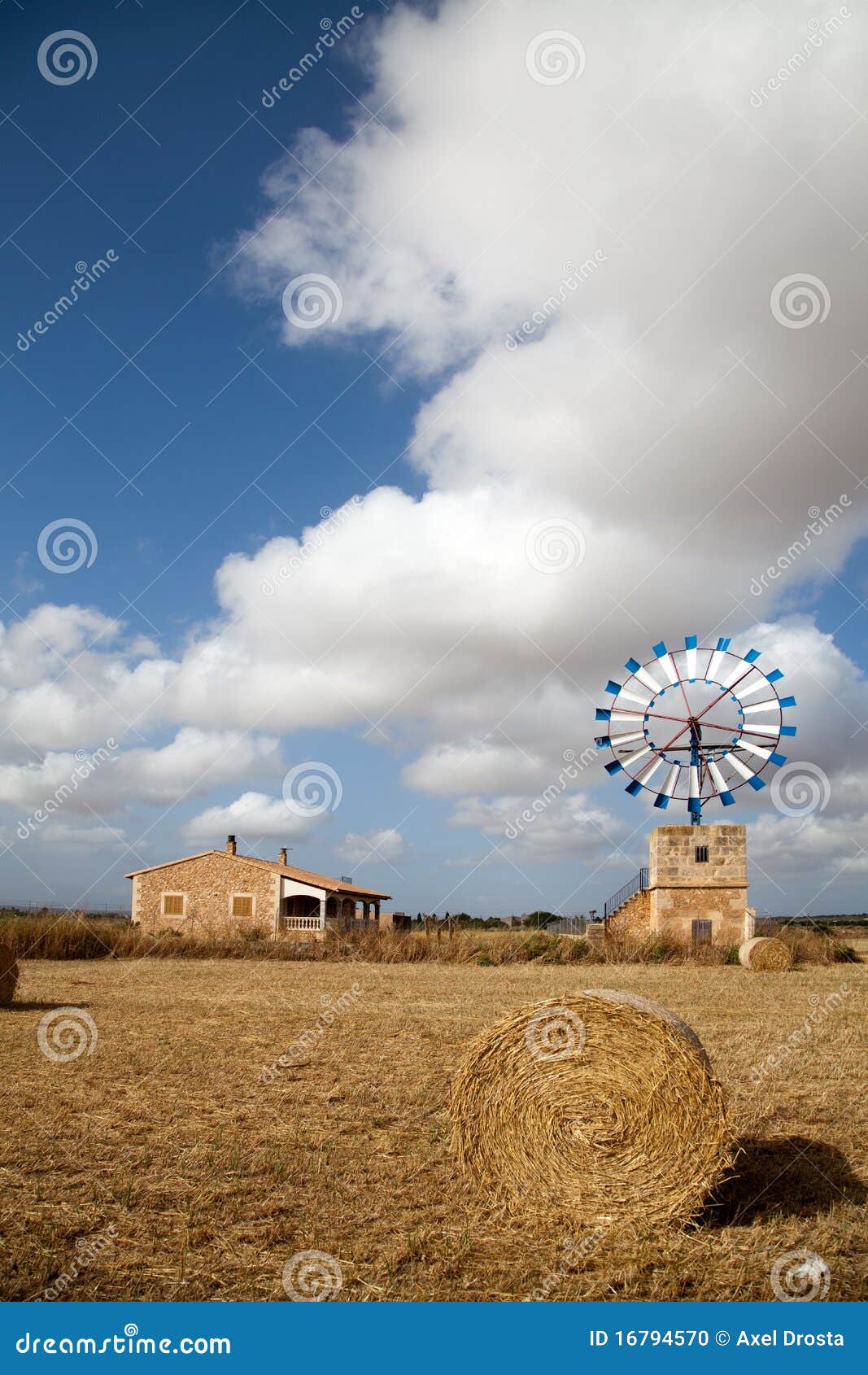 Farm windmill and hay bale stock photo. Image of meadow - 16794570