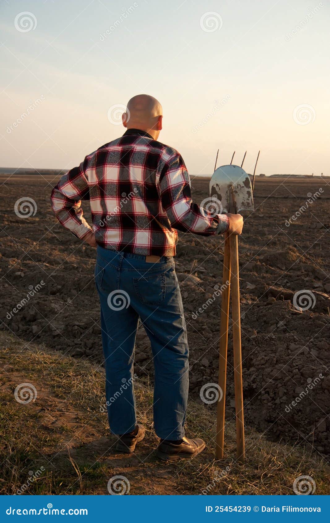Farmer back view stock image. Image of jeans, holding - 25454239