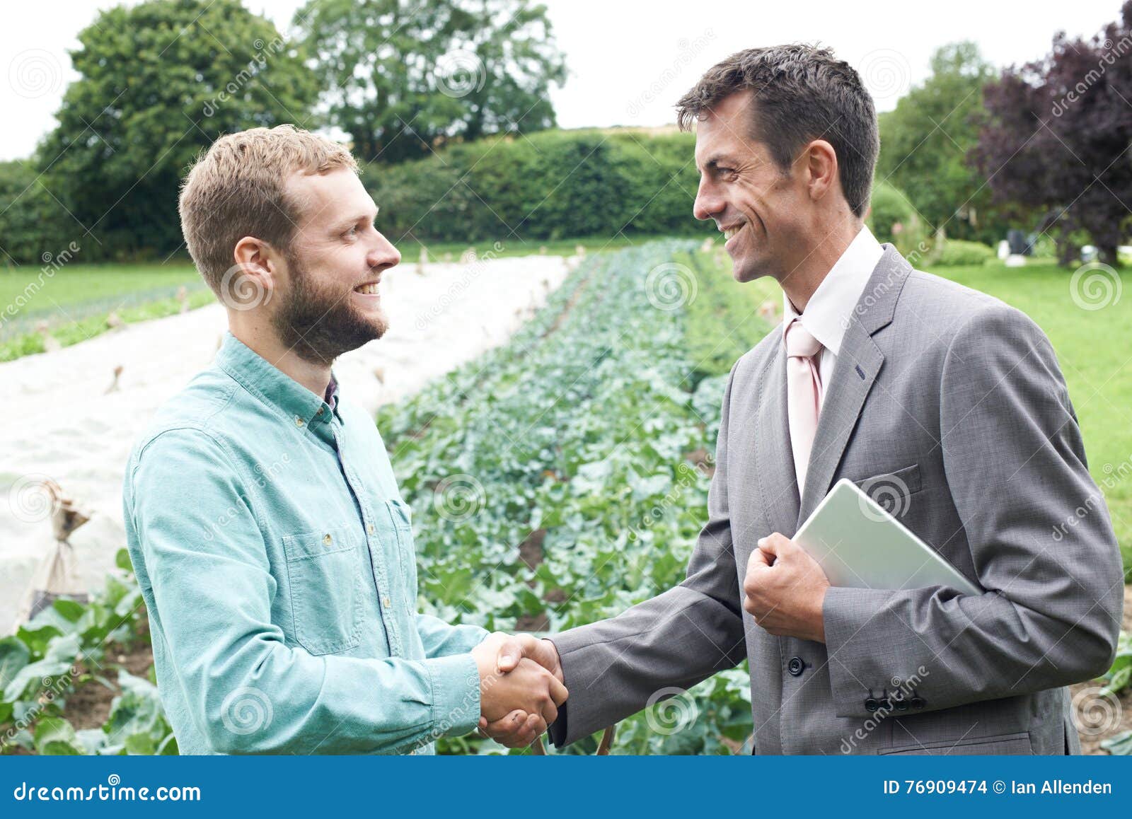Farmer and Businessman Shaking Hands Stock Photo - Image of occupation ...