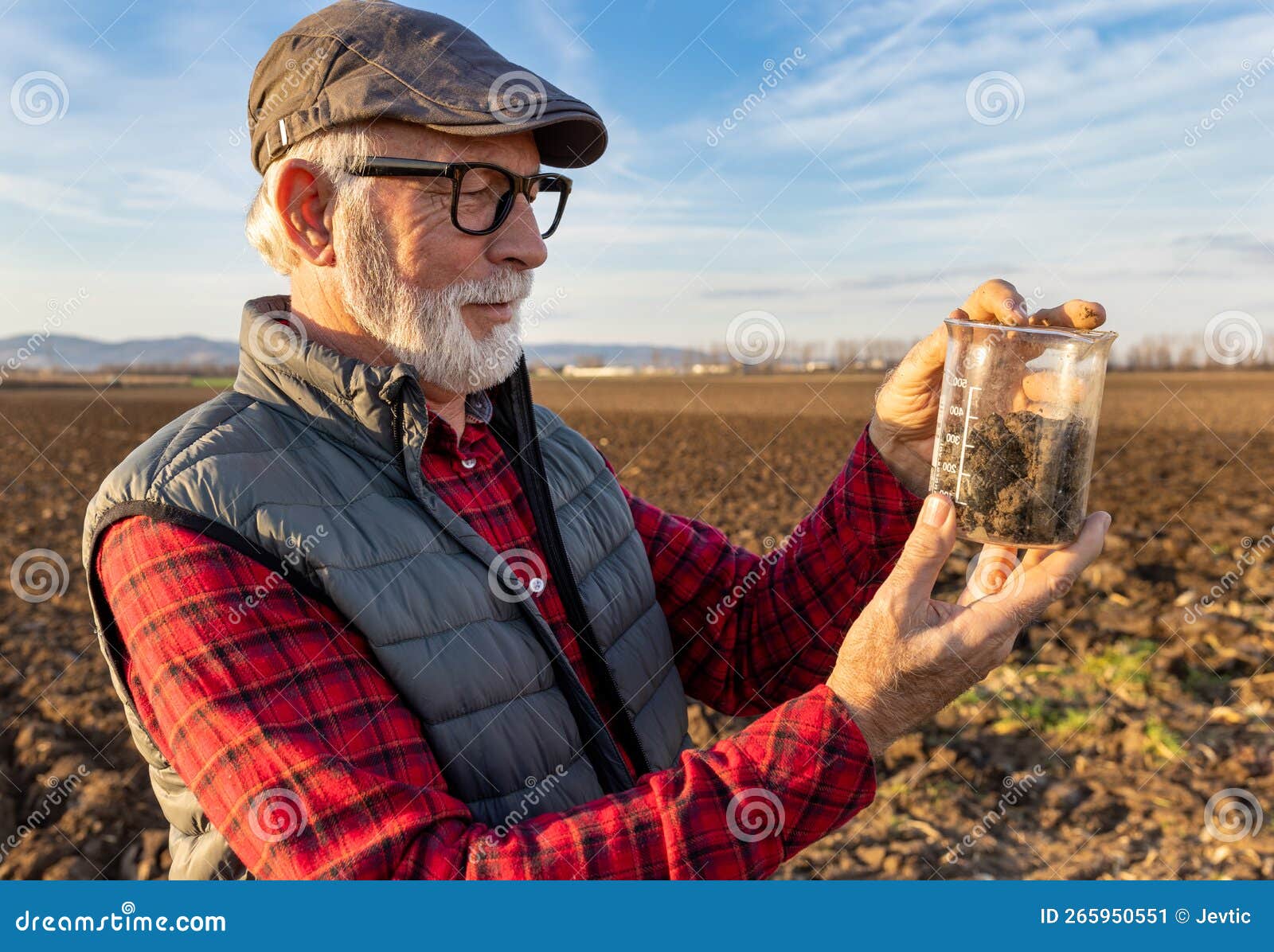 Farmer Checking Soil in Field in Autumn Stock Image - Image of ...