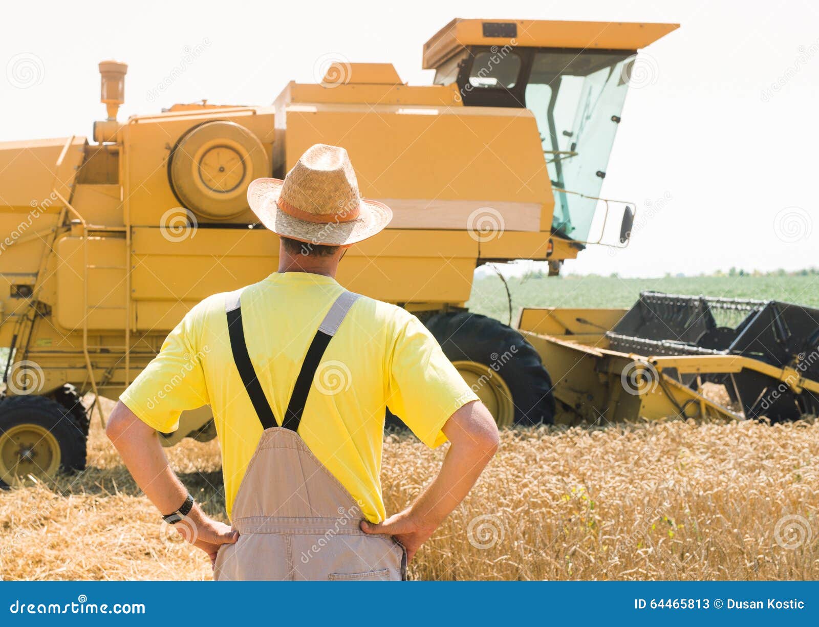 Farmer and combine stock image. Image of field, farming - 64465813