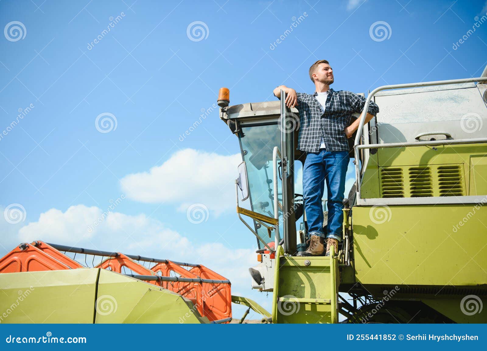 Farmer Controls the Combine Harvester. Stock Photo - Image of caucasian ...