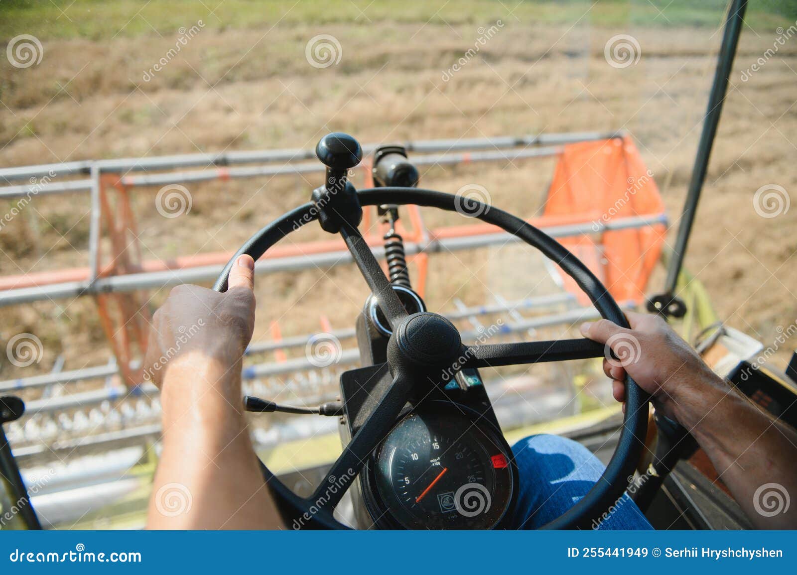 Farmer Controls the Combine Harvester. Stock Image - Image of ...