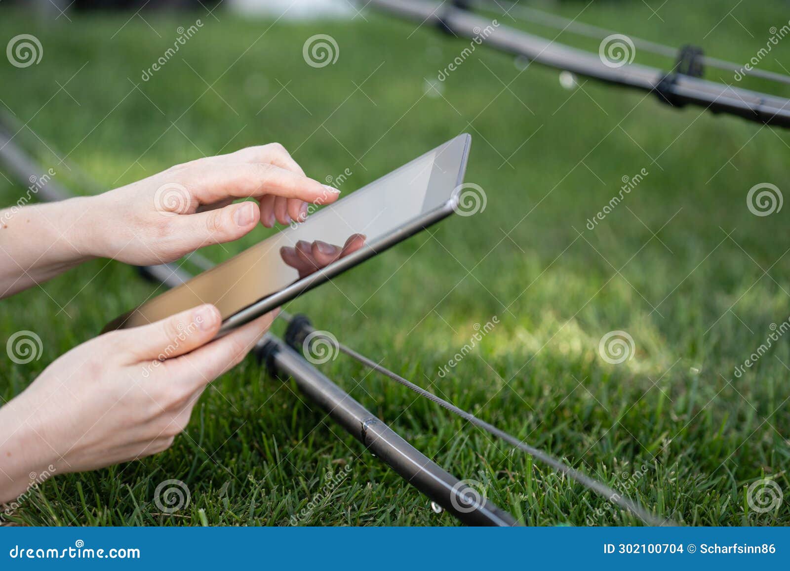 Farmer Controls Drip Irrigation System with Digital Tablet Stock Photo ...