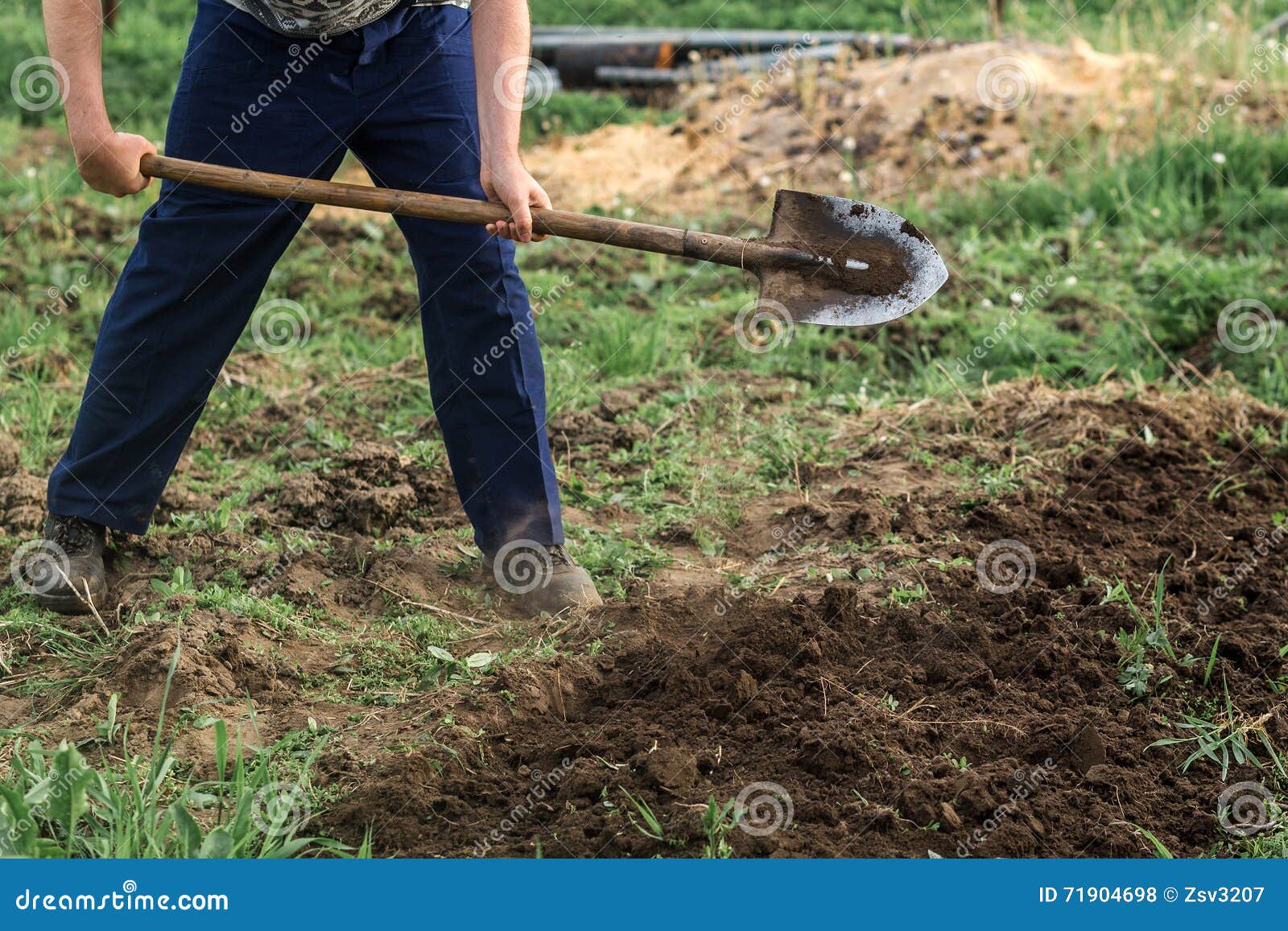 Farmer Digging the Earth To Build a Deep Bed of in the Kitchen Garden ...