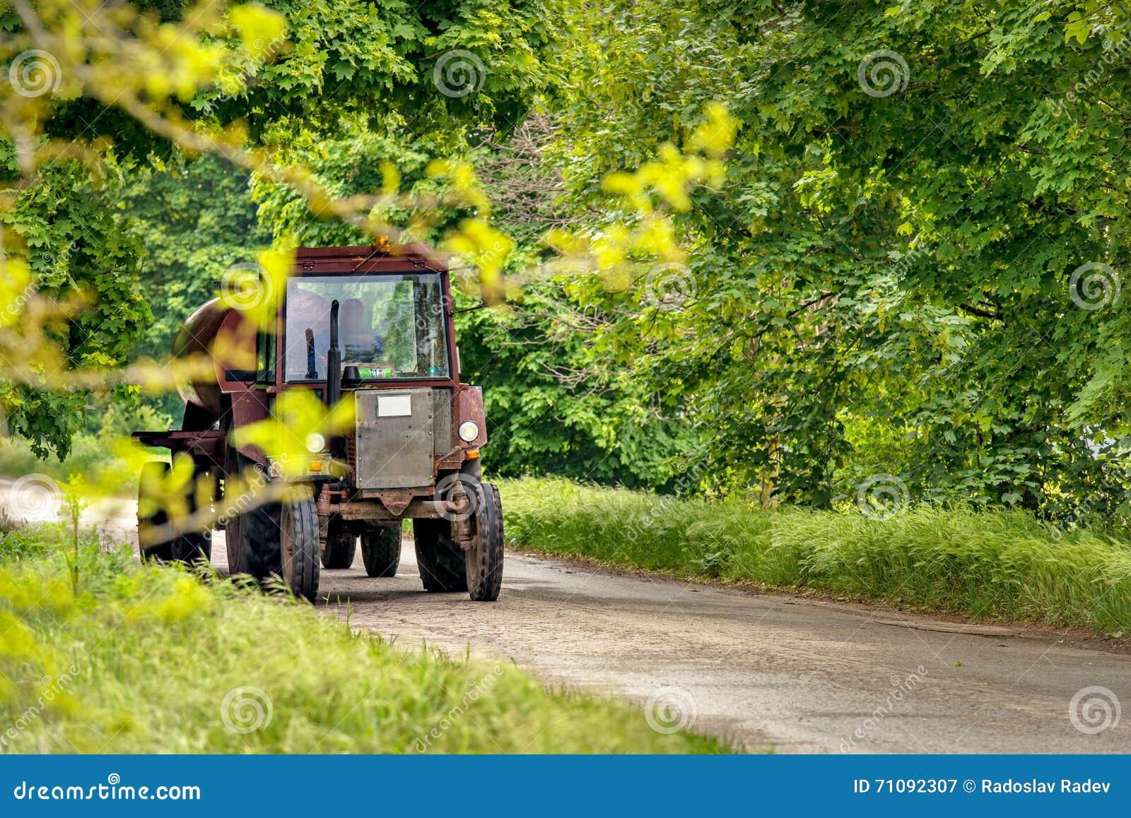 Farmer drives tractor! stock image. Image of farmland - 71092307