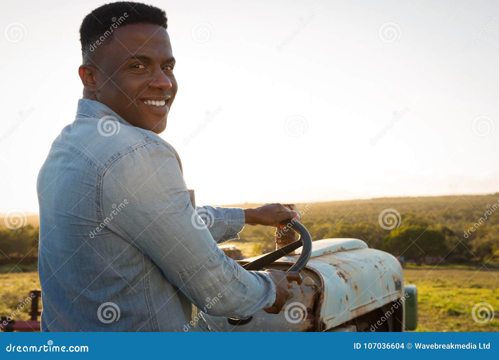 Farmer Driving Tractor at Countryside Stock Photo - Image of harvest ...