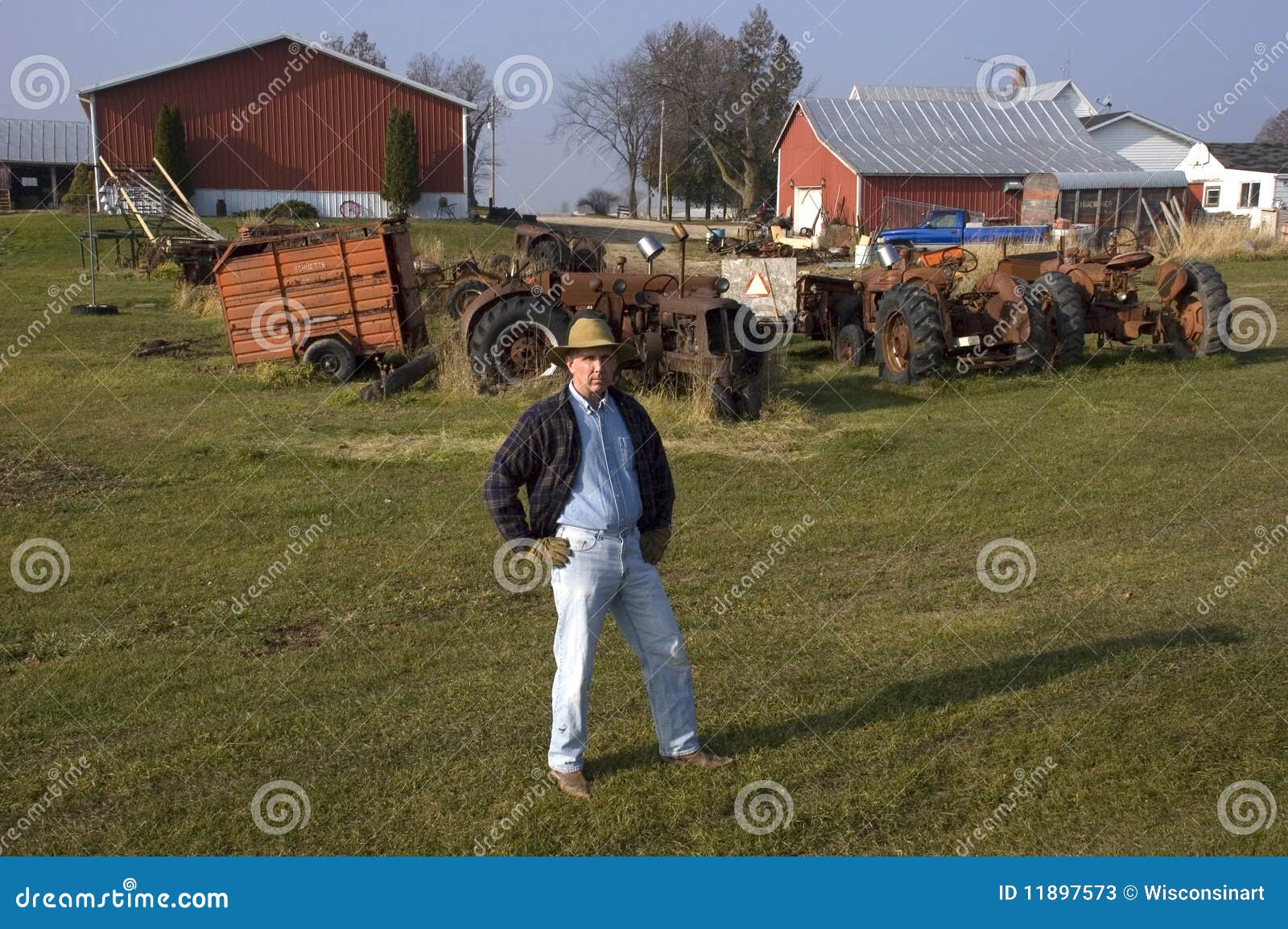 Farmer in Farm Barnyard with Equipment Stock Image - Image of laborer ...