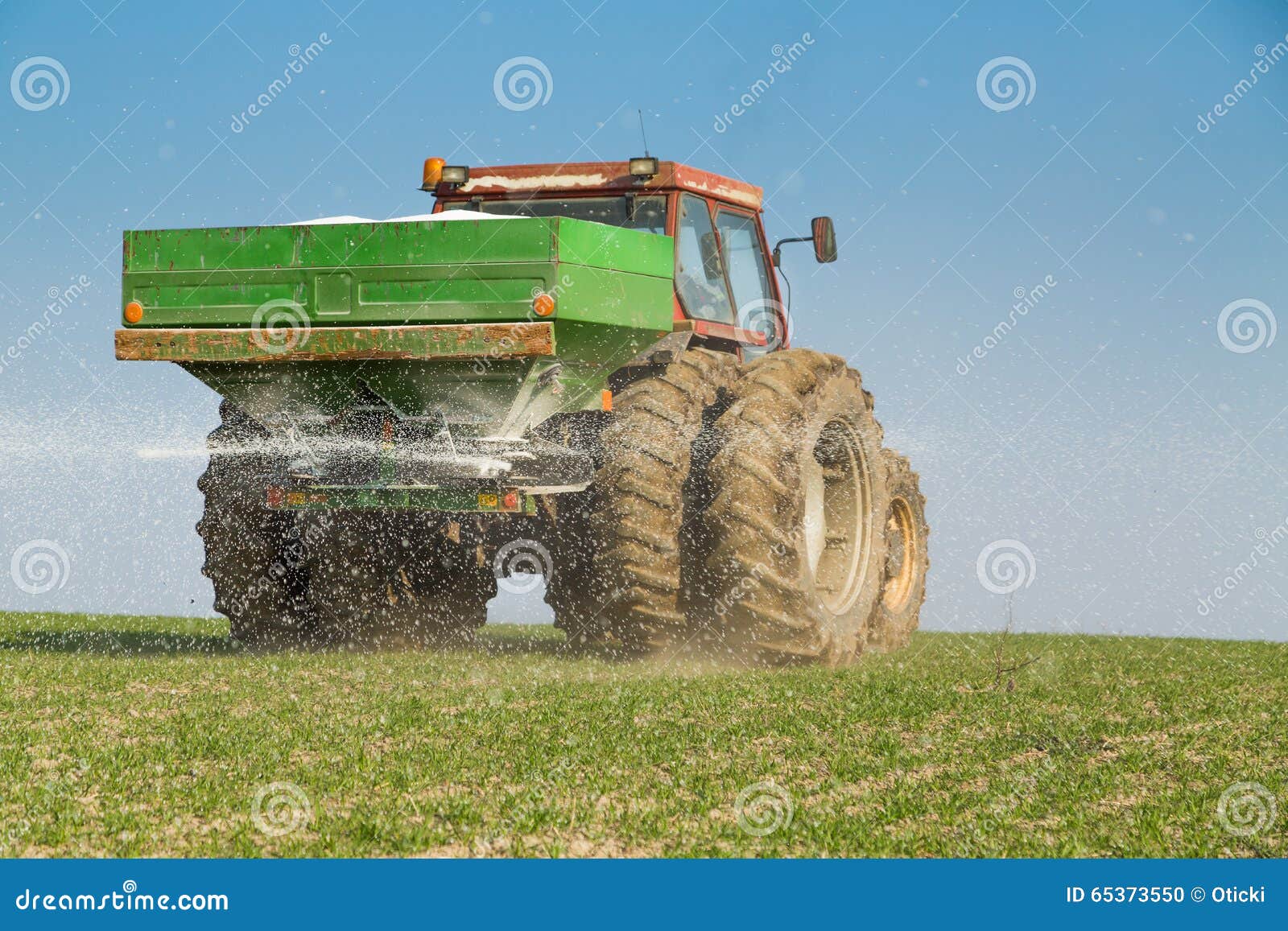 Farmer Fertilizing Wheat with Nitrogen, Phosphorus, Potassium ...
