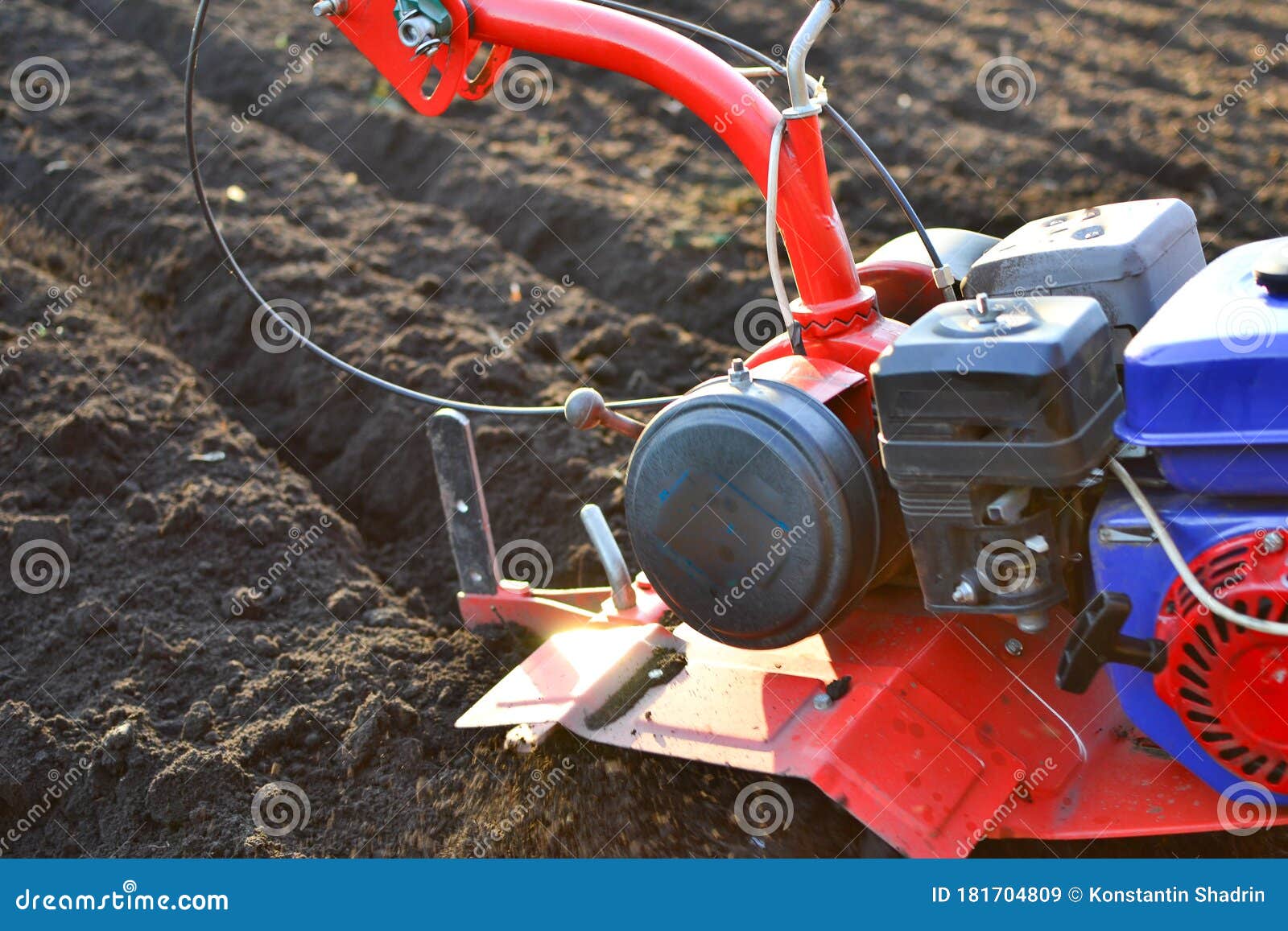Farmer in a Field with Rototiller , Tiller Tractor Stock Image - Image ...