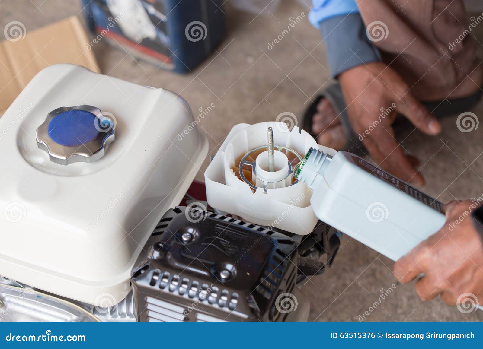 Farmer Fill Engine Oil into Oil Filter of Water Pump Stock Photo ...