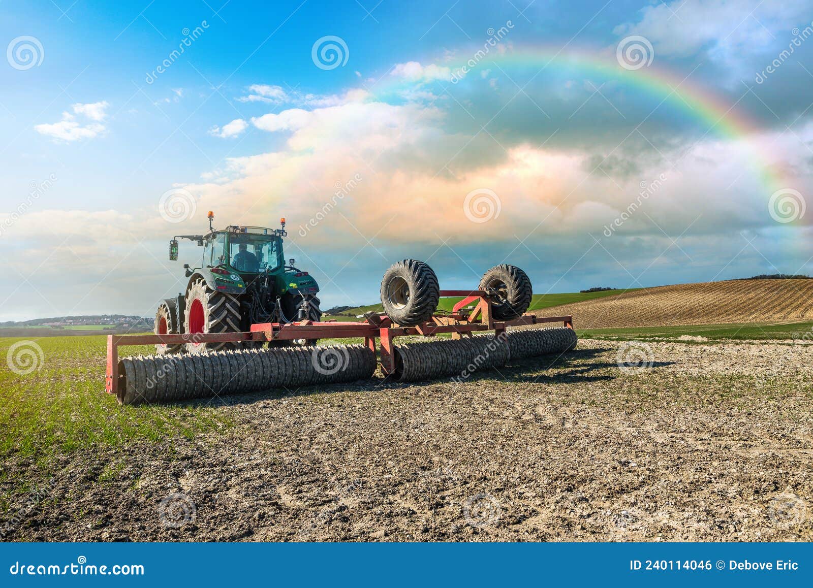 Farmer and His Tractor Equip with a Compaction Roller To Refine the ...