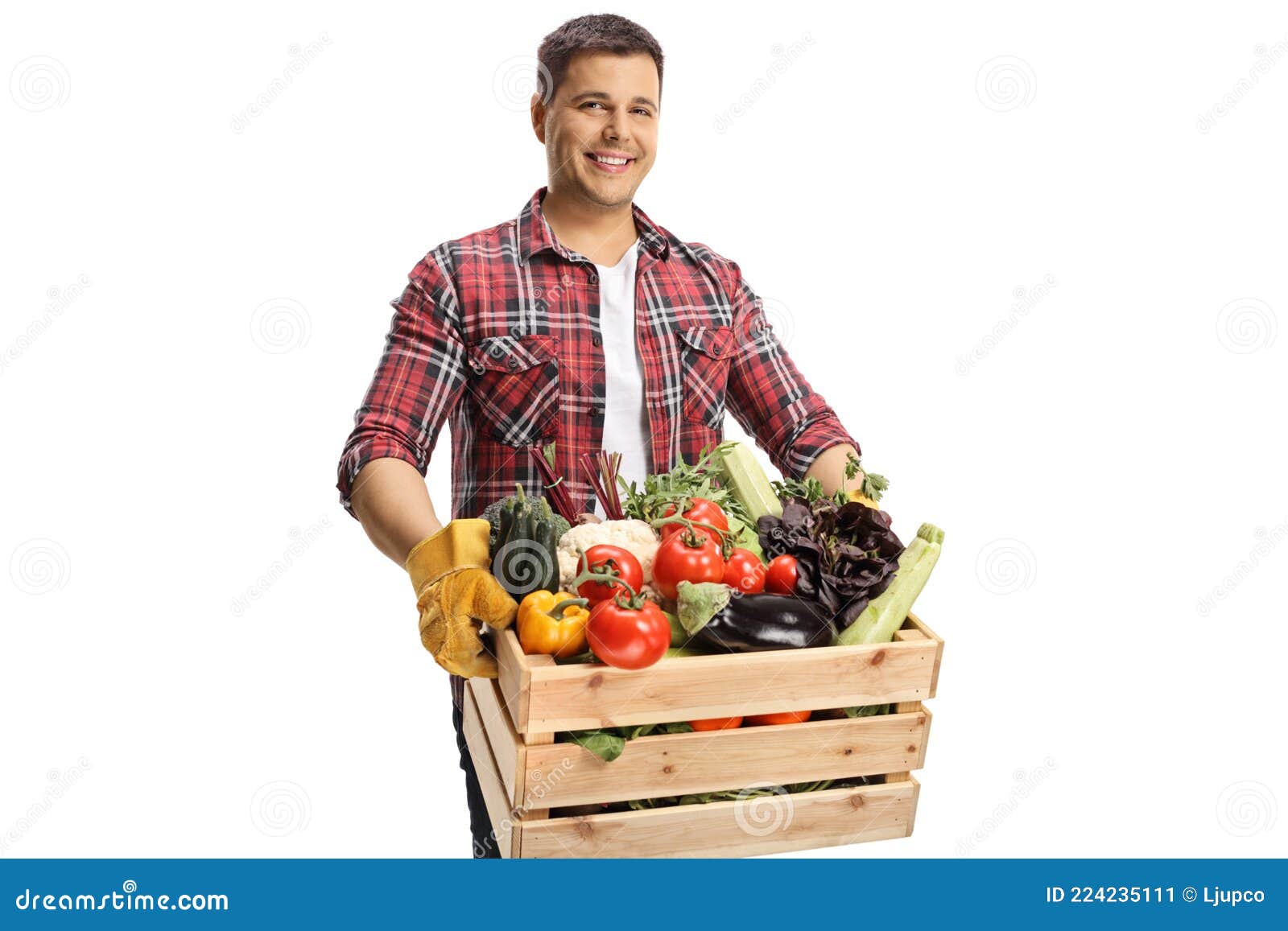 Farmer Holding a Crate with Vegetables and Looking at Camera Stock ...
