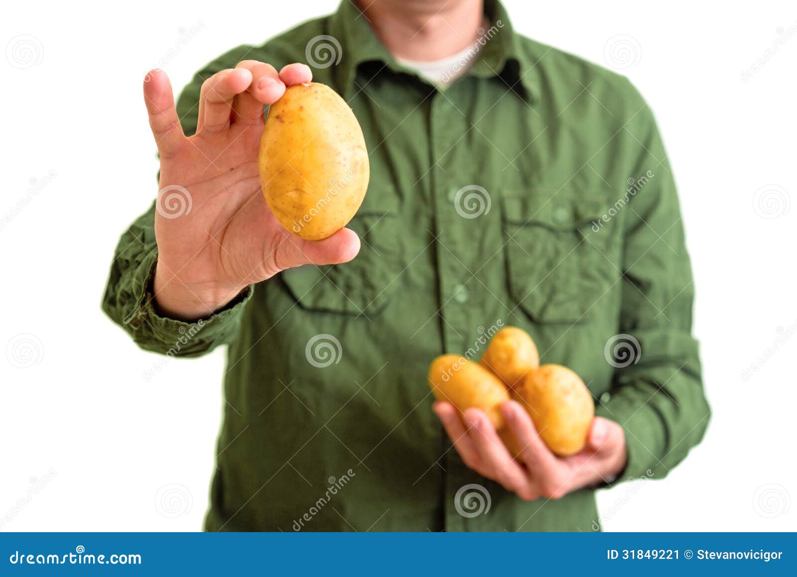 Farmer holding potato stock image. Image of background - 31849221