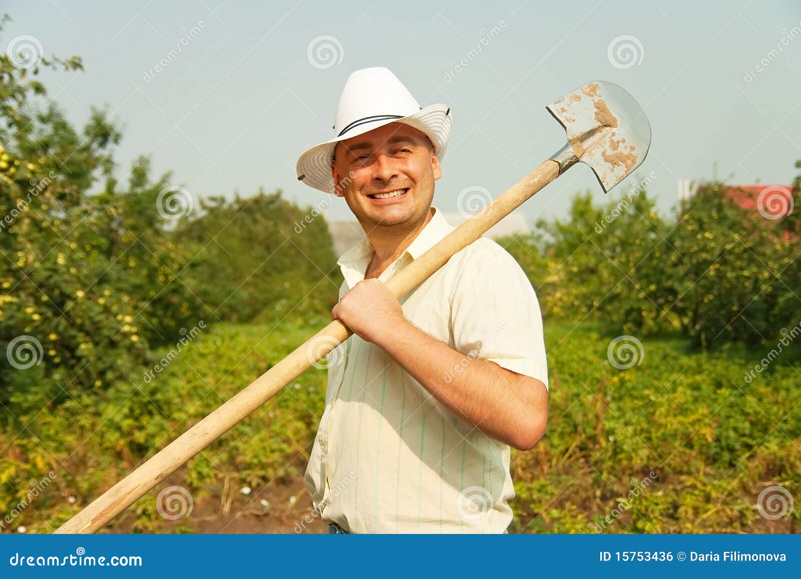 Farmer holding spade stock photo. Image of portrait, farm - 15753436