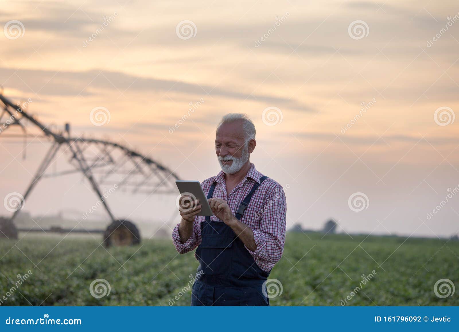 Farmer with Irrigation System Stock Photo - Image of crop, modern ...