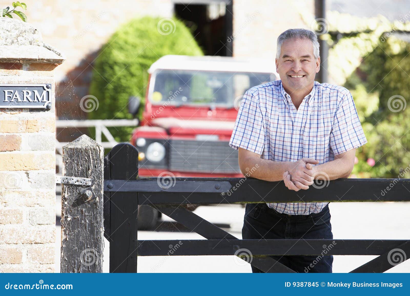 Farmer Looking Over Farm Gate Stock Image - Image of together ...