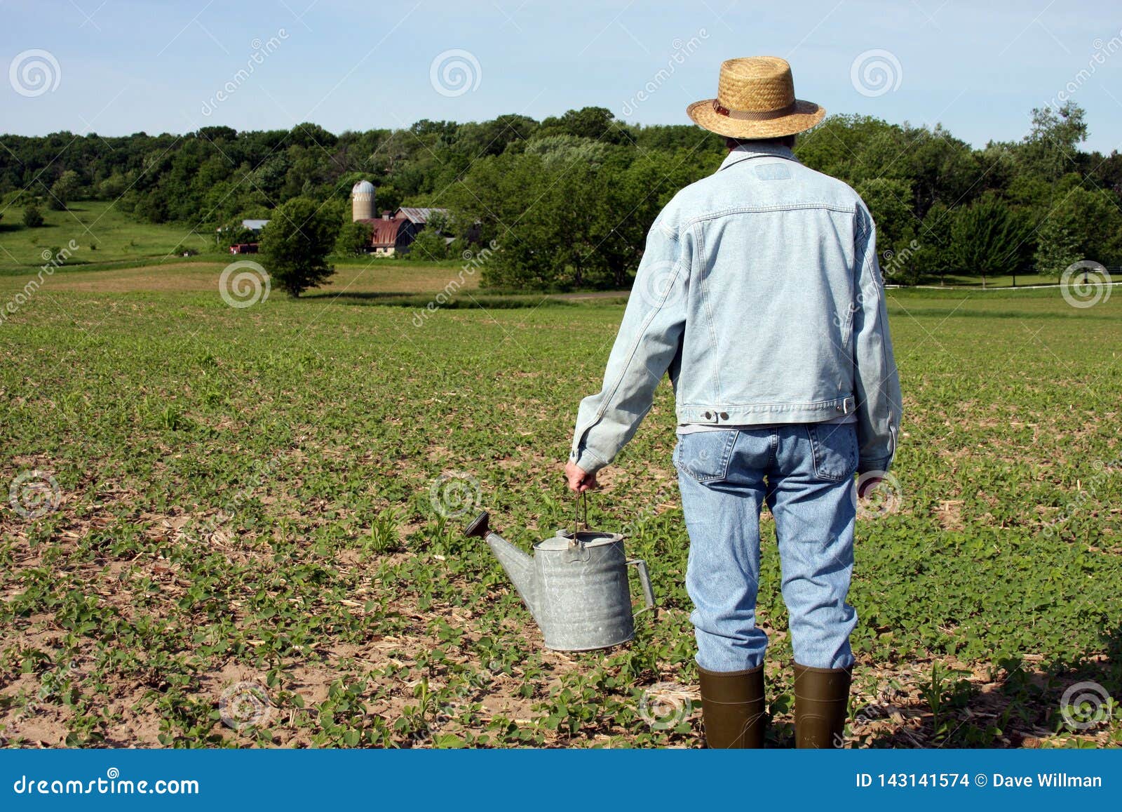 Farmer out in his field stock photo. Image of trees - 143141574
