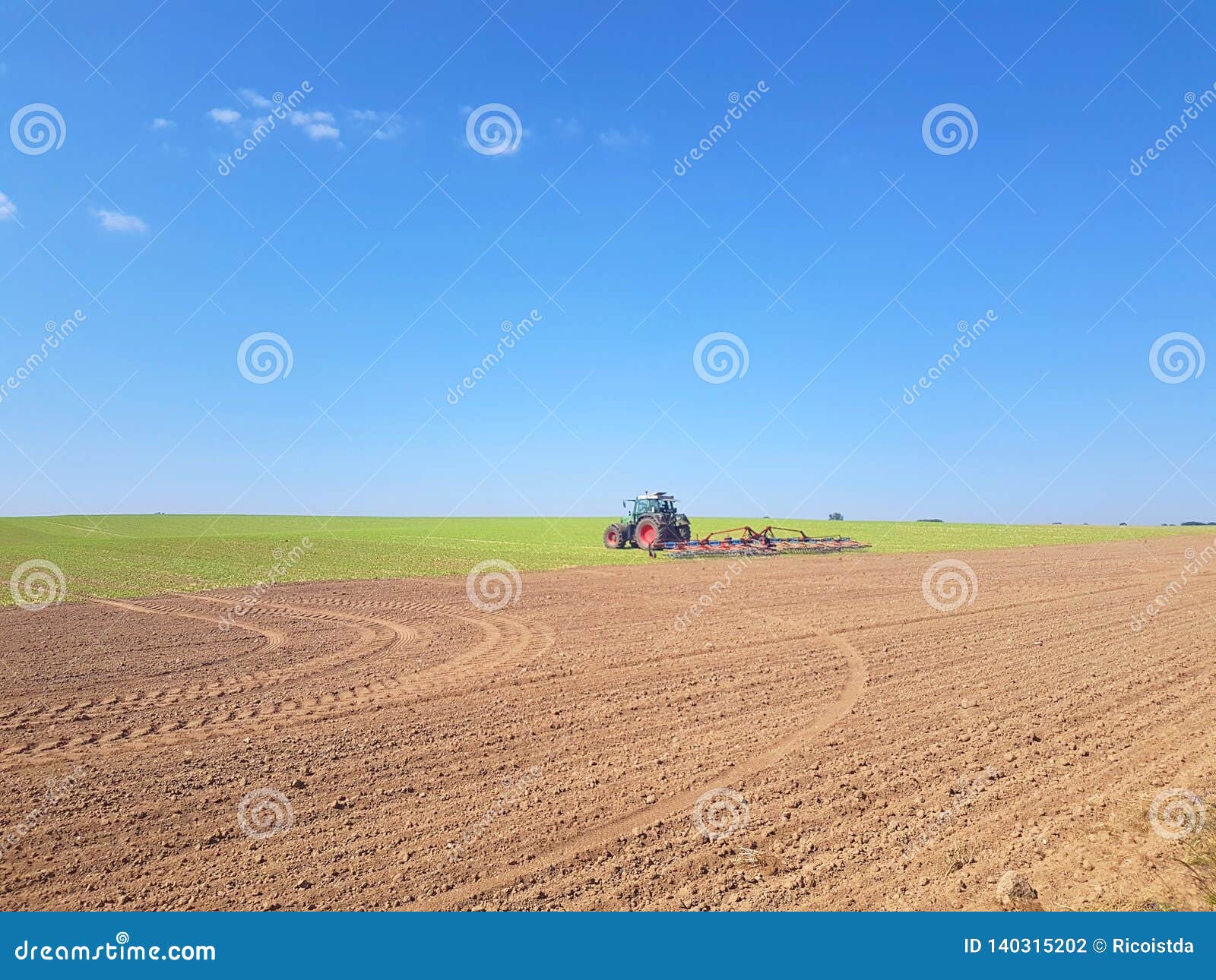 Farmer is Plowing a Field with Tractor Stock Photo - Image of land ...