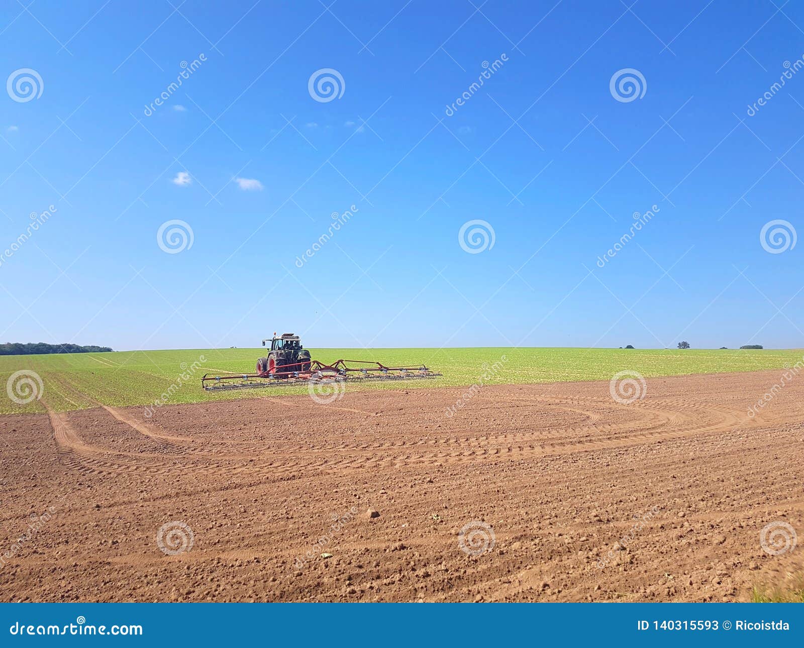 Farmer is Plowing a Field with Tractor Stock Image - Image of gardens ...