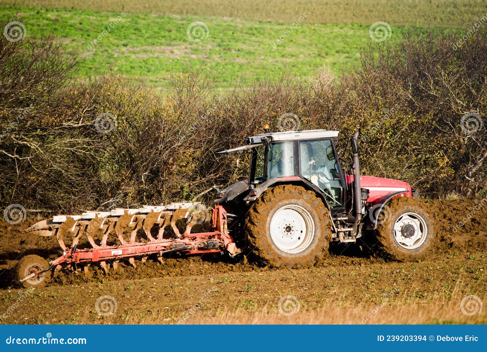 Tractor Equipped with a Plow in Action in a Field Close-up Stock Photo ...