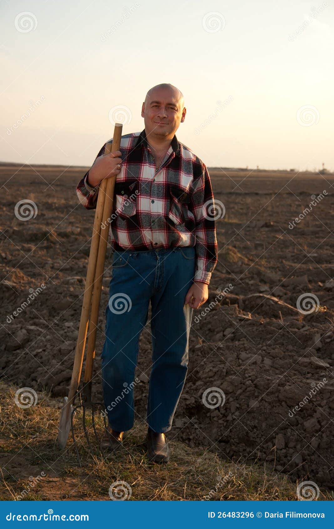 Farmer with Spade and Pitchfork Stock Photo - Image of occupation, dusk ...