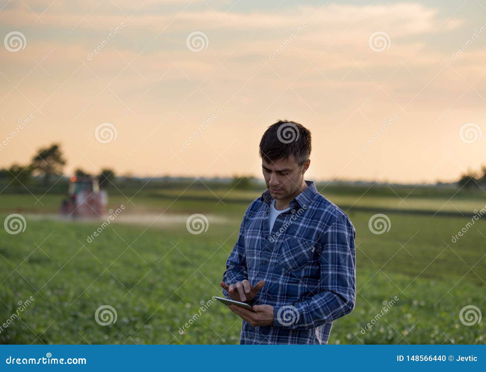 Farmer with Tablet in Field Stock Photo - Image of chemicals, rural ...
