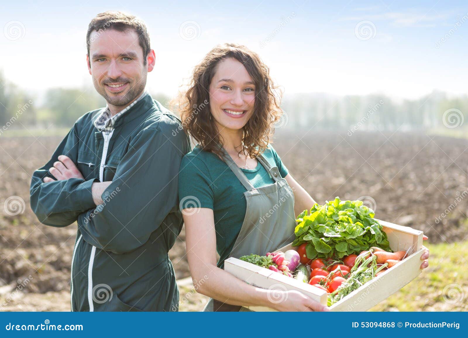 Farmer Team at Work in a Field Stock Photo - Image of woman, portrait ...