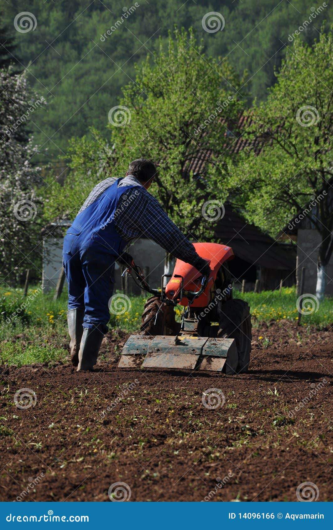 Farmer till the ground stock photo. Image of industry - 14096166