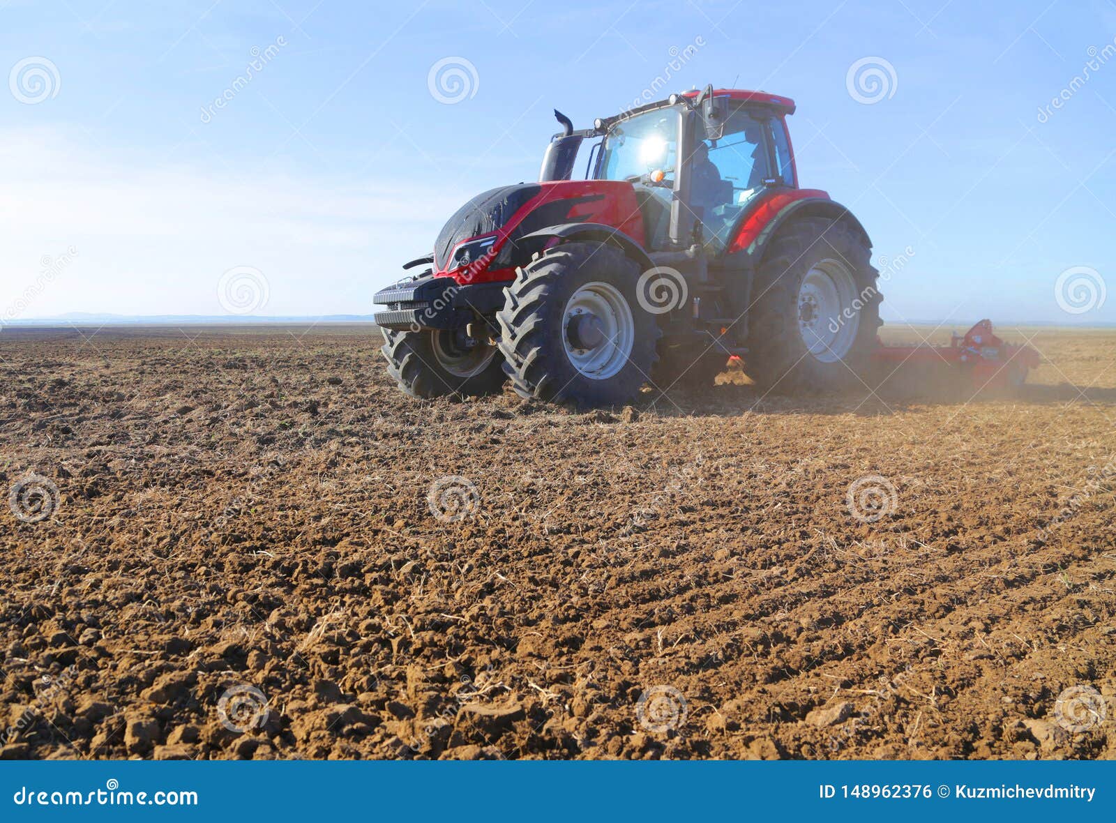 Farmer on Tractor Prepares Land in Spring Stock Photo - Image of ...