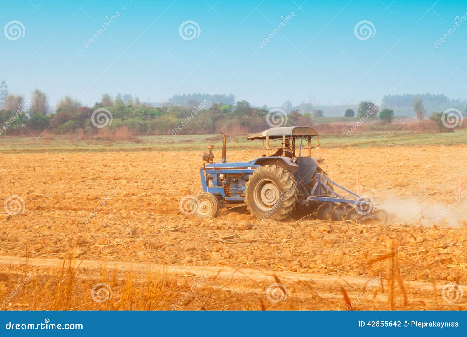 Farmer in Tractor Preparing Land Stock Photo - Image of nature, plowed ...