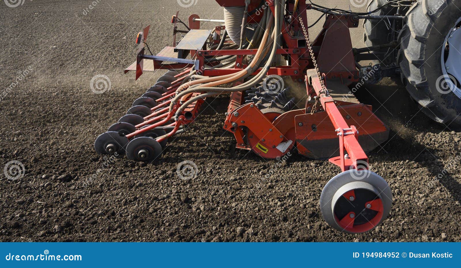 Farmer with Tractor Seeding Crops at Field Stock Photo - Image of crops ...